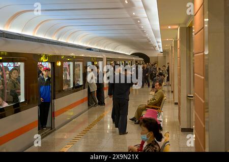 the interior of the station and passengers in the Pyongyang subway ...