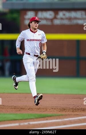 June 1, 2024: Razorback first baseman Ben McLaughlin #6 moves back over ...