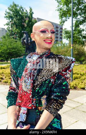 Equality March in Opole. Drag Queen poses against the background of ...