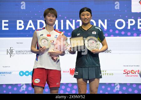 Singapore. 2nd June, 2024. Champion An Se Young poses on the podium after the women's singles ...