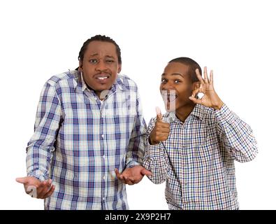 Closeup portrait two rude, difficult, angry young men gesturing with ...