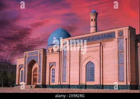ancient old minaret of Khast Imom mosque on background at blue sky in ...