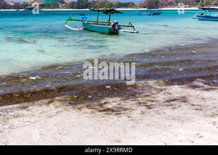 Floating garbage on the ocean off a tropical beach (Indonesia Stock ...