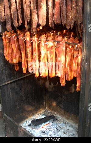 Dried buffalo meat hanging in a smoking cabinet, Cat Cat village, Sapa ...