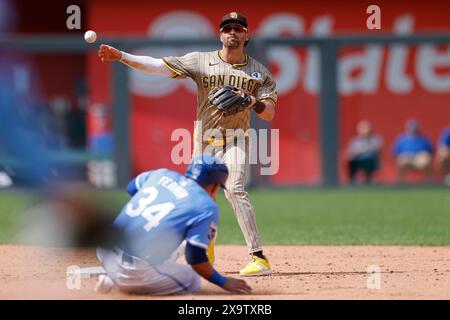 San Diego Padres' Tyler Wade hits against the Athletics during a spring ...