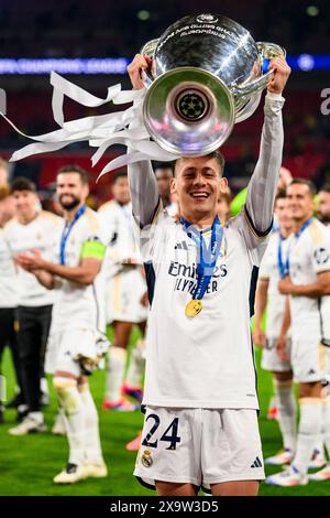 Real Madrid's Arda Guler celebrates after scoring his side's opening ...