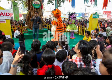 Hundreds of cheering children played with Halum, Ikri, Tuktuki and ...