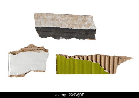 White and green scraps of recycled green and black cardboard box ...