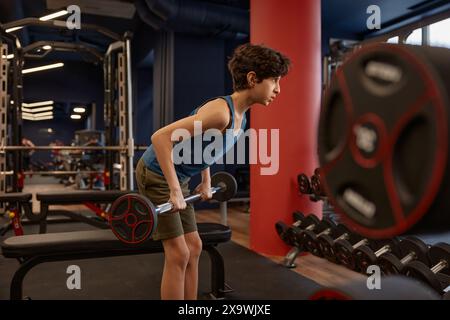 Confident schoolboy enjoying bodybuilding workout Stock Photo - Alamy