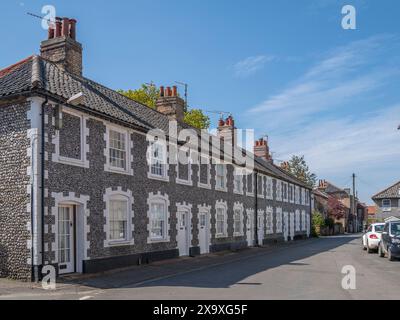 A pretty row of flint cottages Stock Photo - Alamy