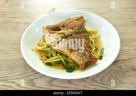 deep fried chop red bass fish slice dressing soy sauce and celery on ...