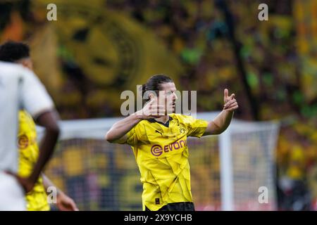 Marcel Sabitzer of Borussia Dortmund and Vinicius Junior of Real Madrid ...