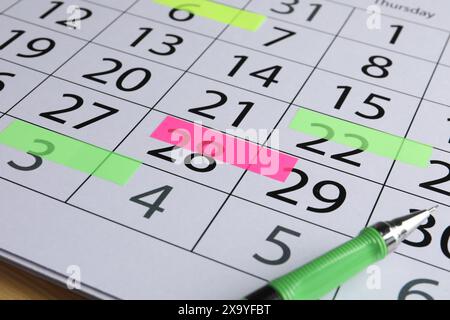 Closeup of dates on calendar page Stock Photo - Alamy