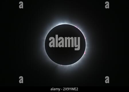 A solar eclipse featuring a diamond ring effect and baileys beads Stock ...
