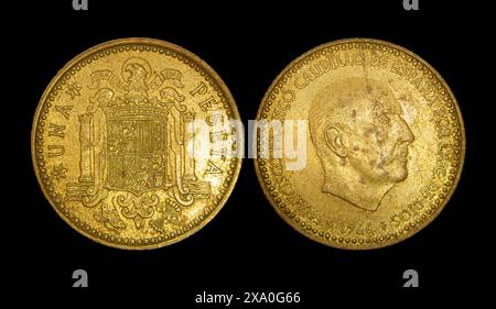 A Spanish peseta coin with Francisco Franco on a gold background Stock ...