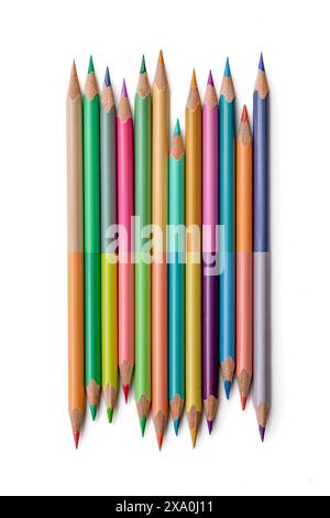 Double sided bright and pastel color pencils isolated on white ...
