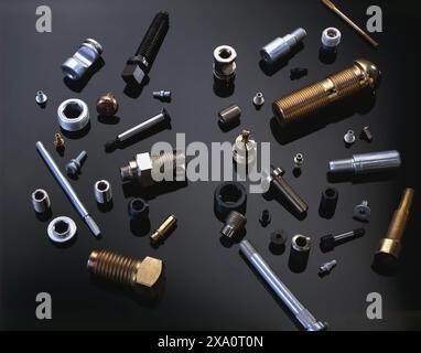 Black metal hardware components, including mounting brackets and screws ...