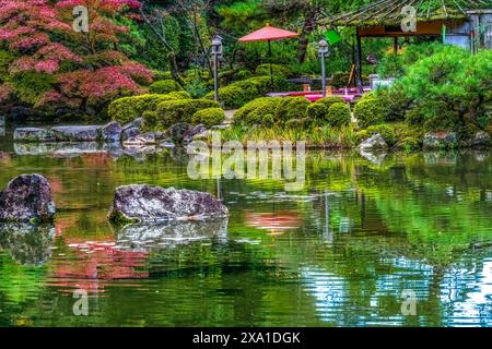Colorful garden, water reflection, Choshin-tei Tea House, Heian-jingu ...
