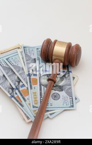 Judges hammer with money to show a judgment paid with cash Stock Photo ...