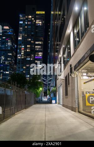 Urban back-alley cityscape at night Stock Photo - Alamy