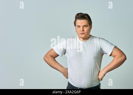 Angry, frowning man on a gray background, copy space Stock Photo - Alamy
