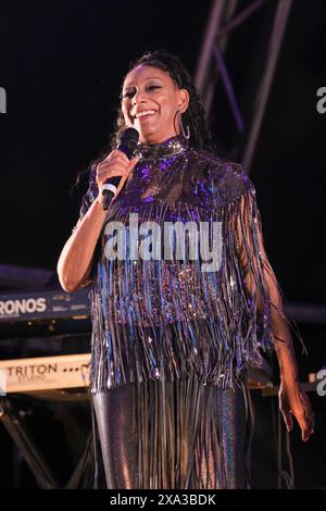 Debbie Sledge of Sister Sledge performing at Wychwood Festival ...
