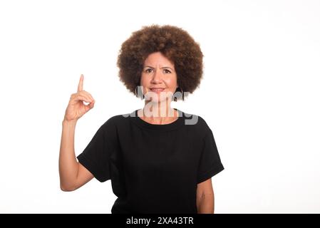 Interpreter of the Brazilian sign language, Libras, making the letter B ...