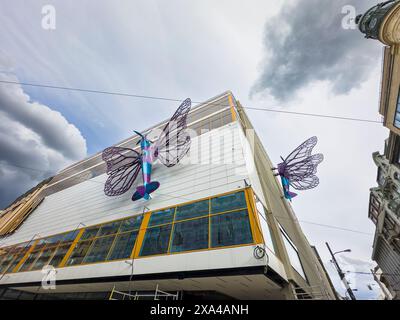 Installation of artworks on the facade of renovated Maj department ...