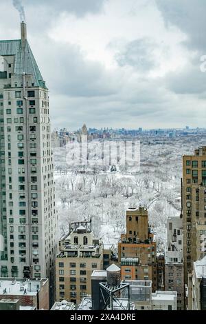 Tall residential skyscrapers under a cloudy sky in an urban setting ...