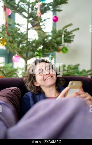 Decorated Christmas tree in room, closeup Stock Photo - Alamy