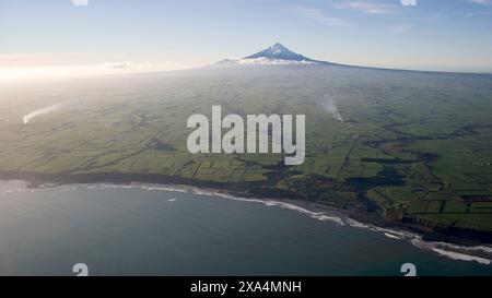 A scenic view of cultivated farmland under a clear blue sky Stock Photo ...