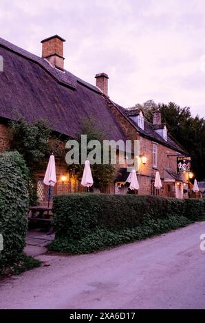The 'Faulkland Arms' pub in the quintessential Cotswold village of ...