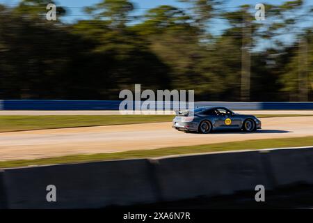 A gray Porsche racing on Sebring track, USA Stock Photo - Alamy