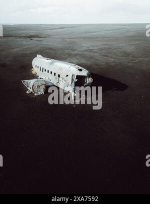 The wreck of the DC-3, abandoned for decades on the black sand beach of ...