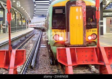 Single southern railway train next to buffer stop about to depart from ...
