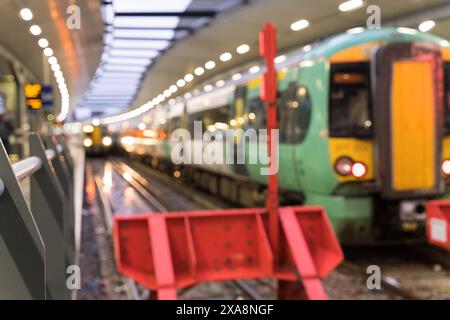 Single southern railway train next to buffer stop about to depart from ...