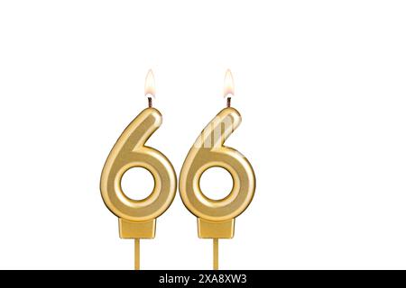 Birthday number 66 - Golden candle on white background Stock Photo - Alamy