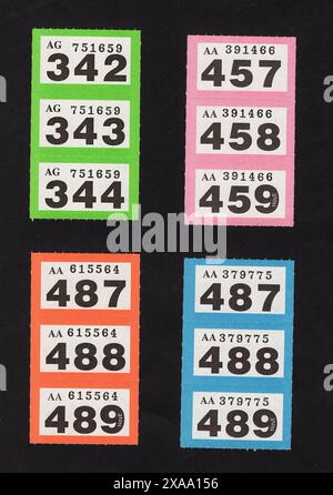 Vintage raffle tickets isolated on a black background Stock Photo - Alamy