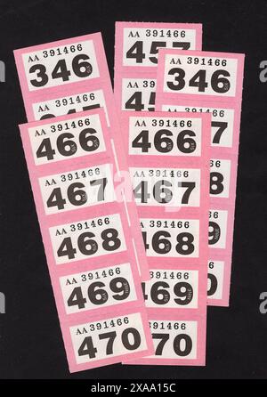 Strips of vintage raffle tickets isolated on a black background Stock ...
