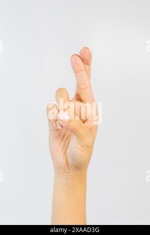 Crossed Fingers: Symbol of Hope and Luck Stock Photo - Alamy