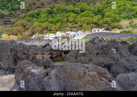 Characteristic volcanic formations next to the sea forming natural ...