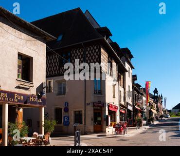 Shops and diners along street of Aubigny-sur-Nere, France Stock Photo ...