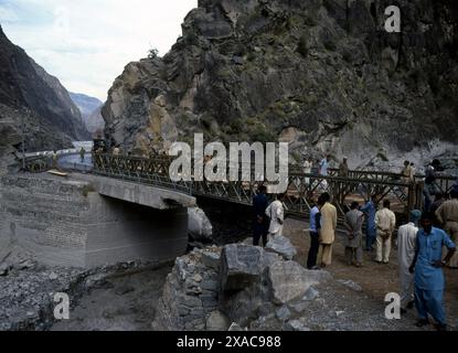 Gilgit areas, N. Pakistan. Emergency bridge repair after flooding 1984 ...