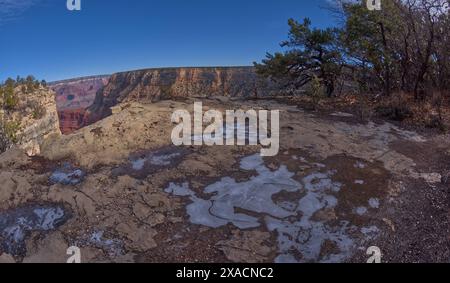 Frozen water puddles along the cliffs of Grand Canyon east of the ...