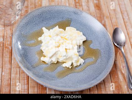 Catalan cheese mato from goat milk with honey Stock Photo - Alamy