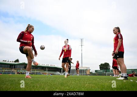 POZNAN, POLAND - 03 JUNE 2024: Wales' Charlie Estcourt, Wales' Georgia ...