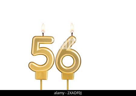 Birthday number 56 - Golden candle on white background Stock Photo - Alamy