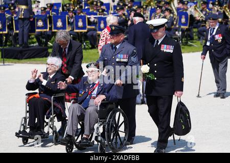 Veterans are escorted at the end of the UK national commemorative event ...