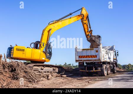 Construction industrial earthworks landscaping on highway bridge ramp ...
