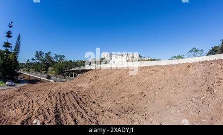 Construction industrial earthworks landscaping on highway bridge ramp ...